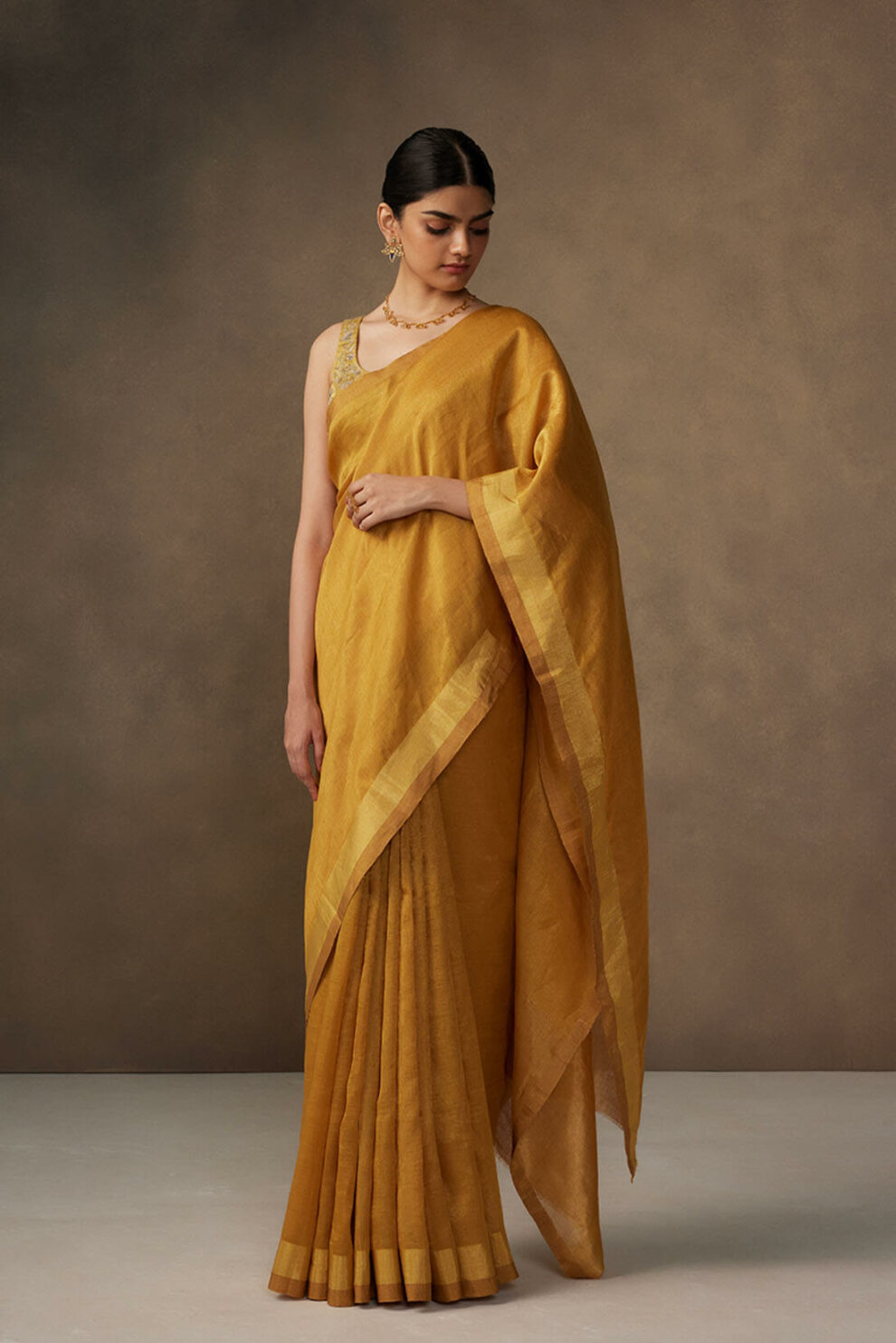 Gold Linen Zari Border Metallic Sari – Anavila